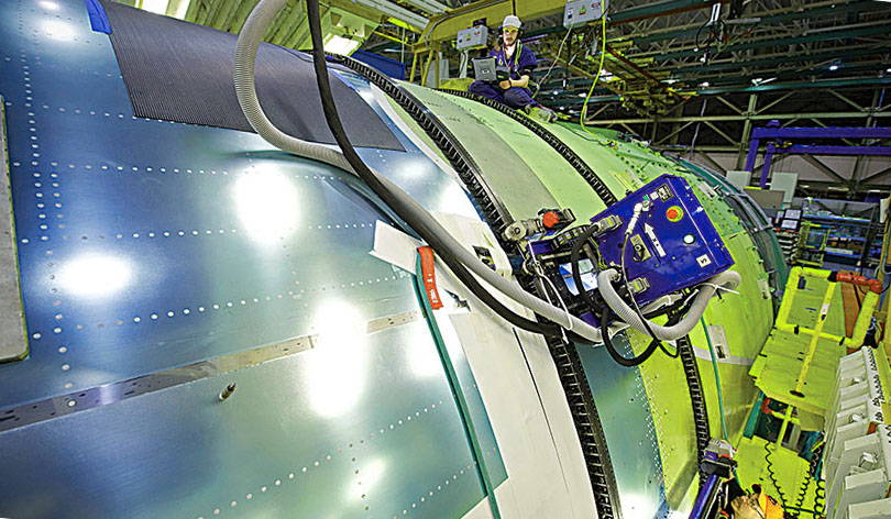 Painting Robots Provide Benefits for Boeing 777 Production